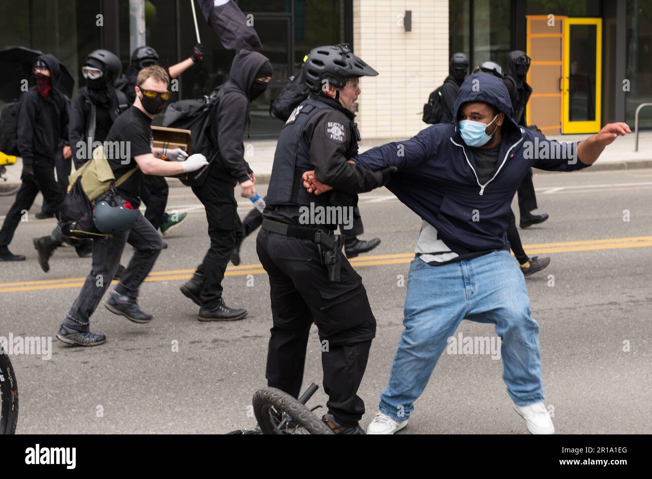 Seattle, USA. 1st May, 2021. Police and protestors during May Day ...