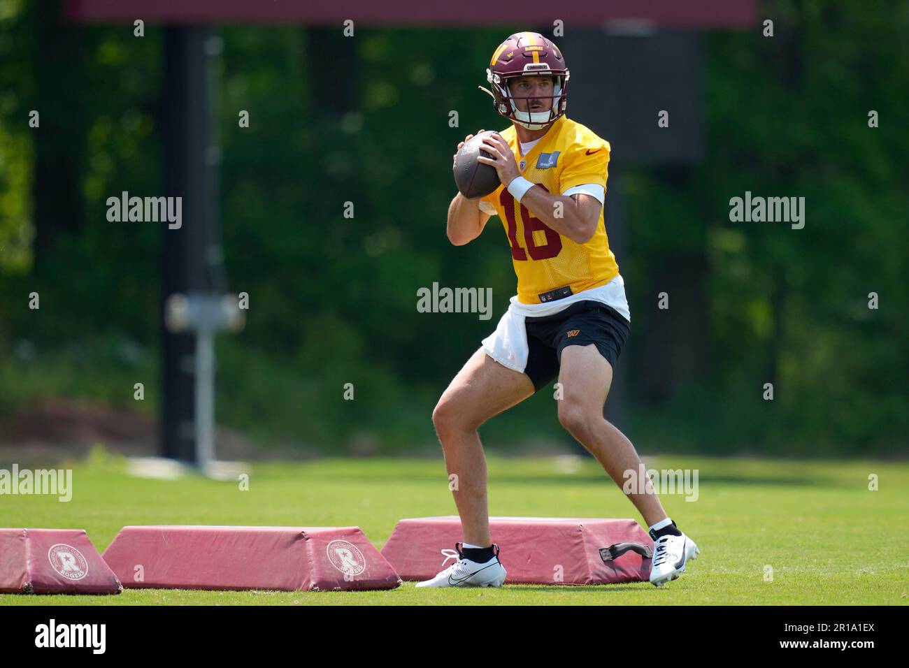 Washington Commanders quarterback Tim DeMorat runs a drill during the ...