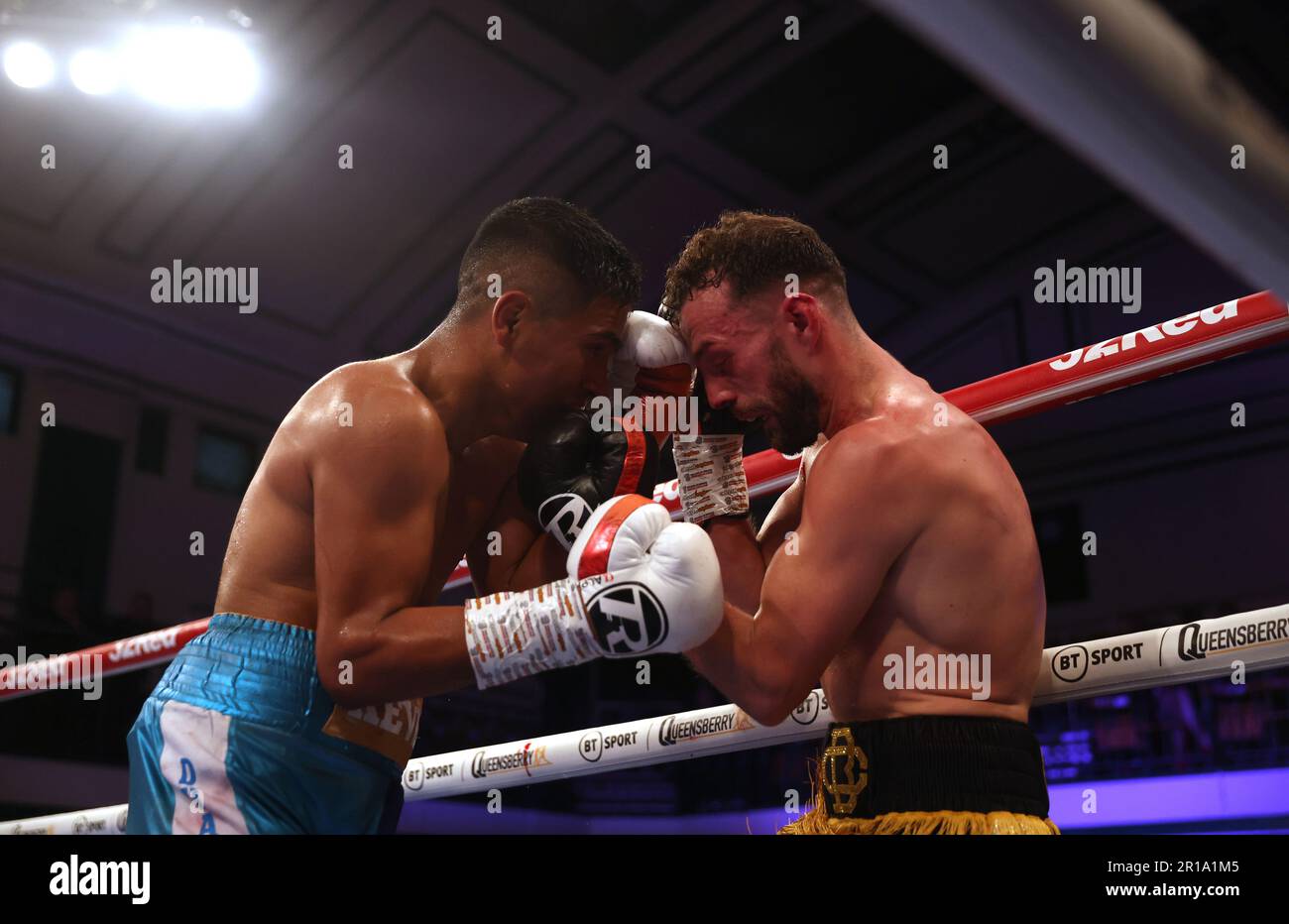Kevin Trana (left) competes against Chris Bourke (right) in the ...