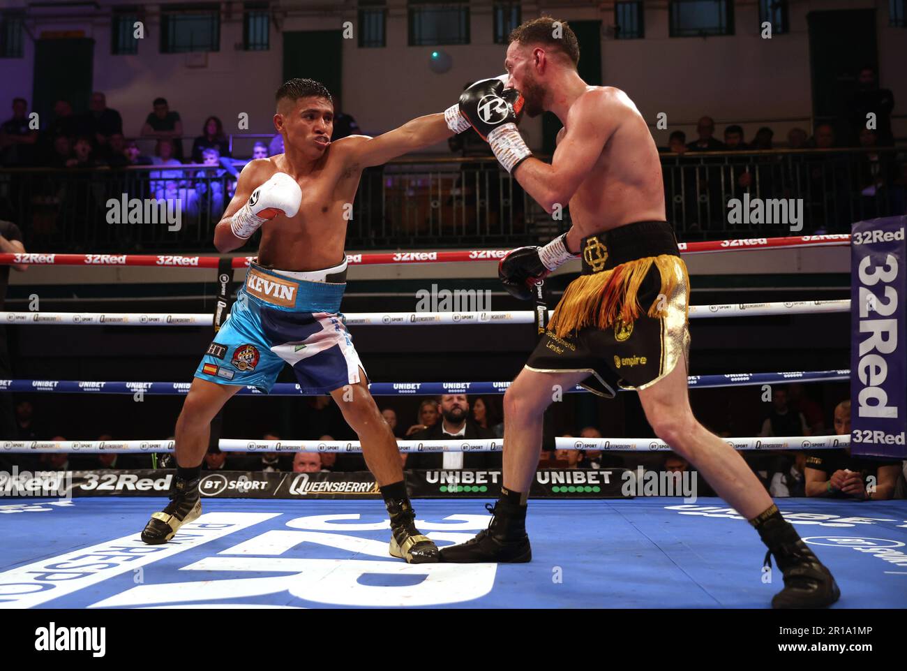 Kevin Trana (left) competes against Chris Bourke (right) in the ...