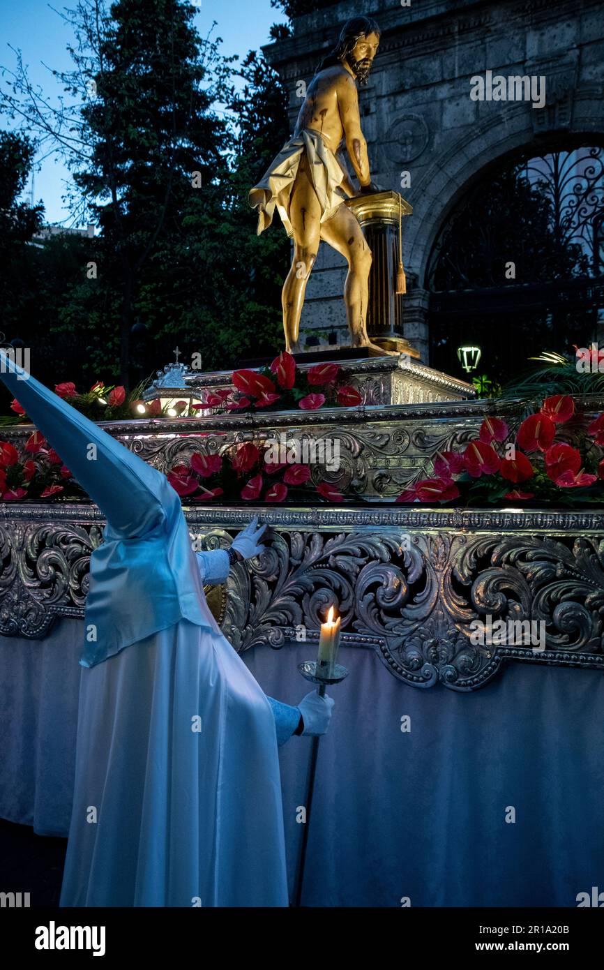 A Penitent of Hermandad Penitencial de Ntro. Padre Jesús Atado a la ...