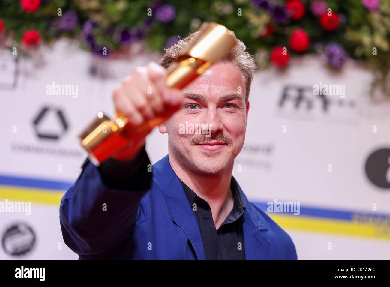 Berlin, Germany. 12th May, 2023. Actor Albrecht Schuch wins the Lola in ...