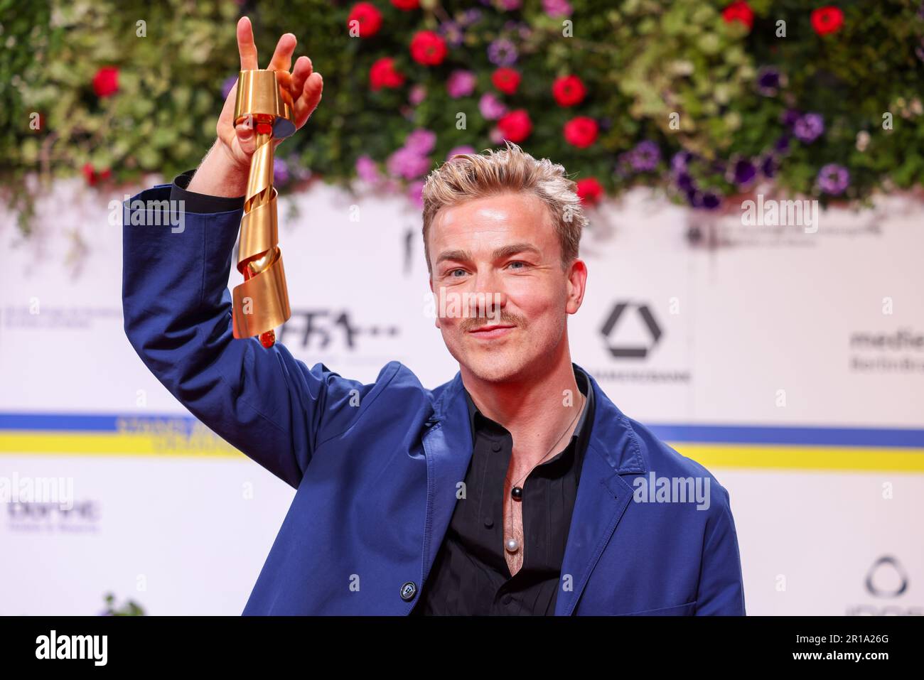 Berlin, Germany. 12th May, 2023. Actor Albrecht Schuch wins the Lola in ...