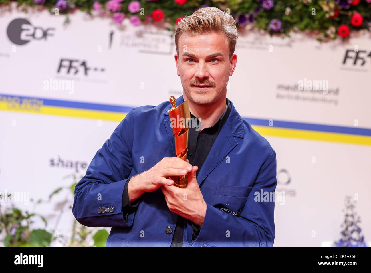 Berlin, Germany. 12th May, 2023. Actor Albrecht Schuch wins the Lola in ...