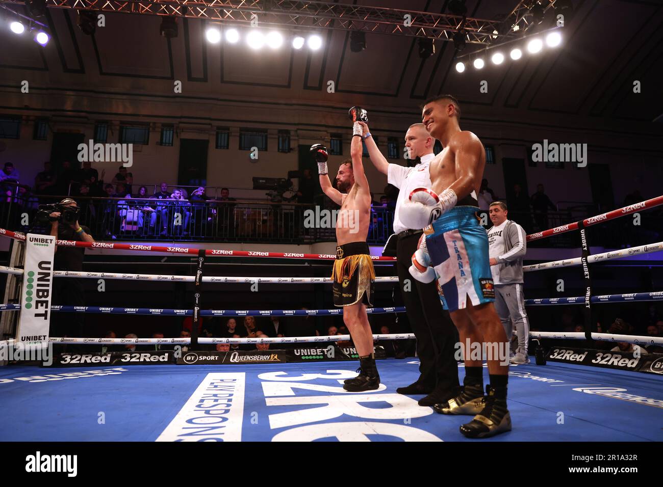 Chris Bourke (left) celebrates victory over Kevin Trana (right) in the ...