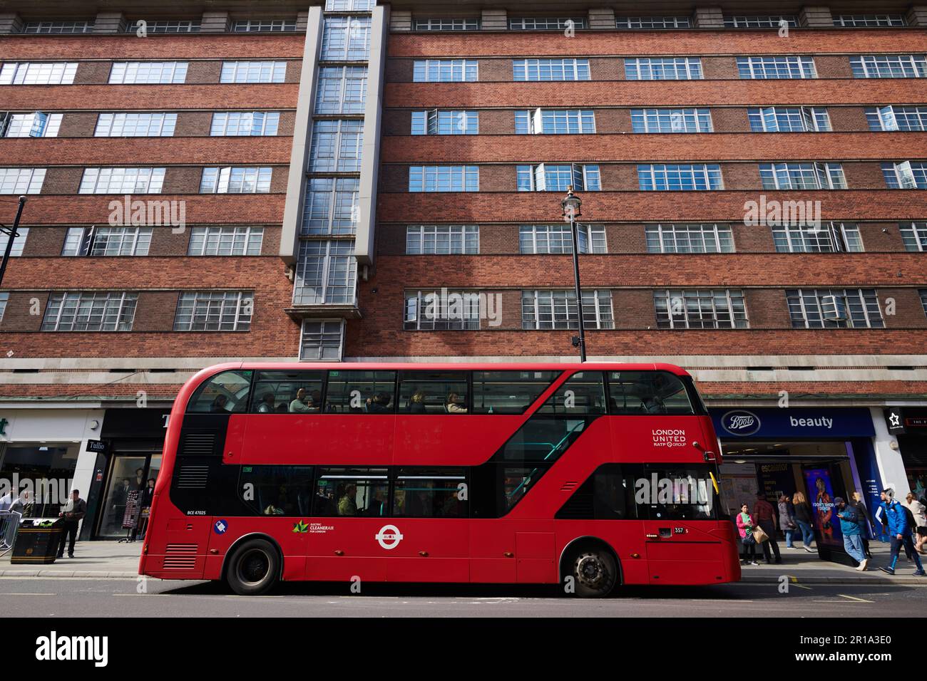 Red double decker bus in London on Oxford Street in the city centre ...
