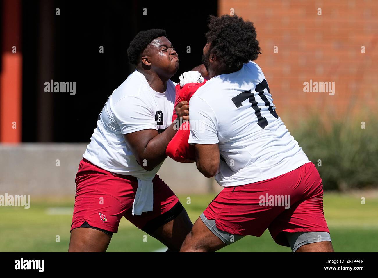 Arizona Cardinals rookie Paris Johnson Jr. and Jon Gaines II, left ...