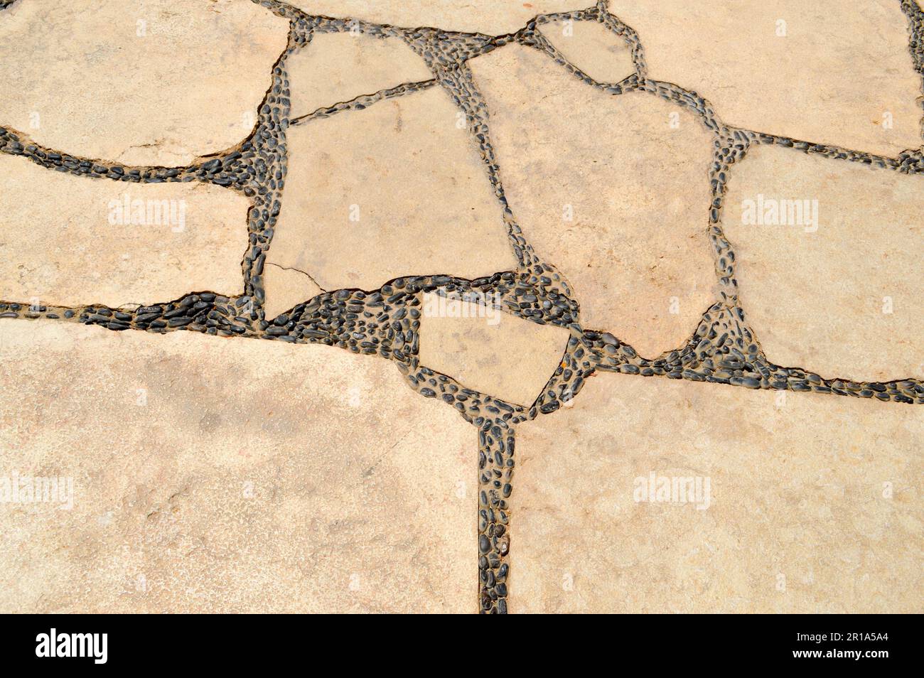 Texture of a stone wall, roads from stones, bricks, cobblestones, tiles ...
