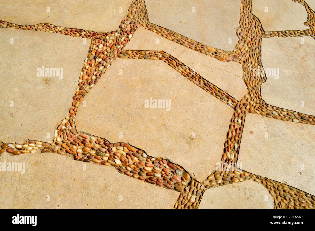 Texture of a stone wall, roads from stones, bricks, cobblestones, tiles ...