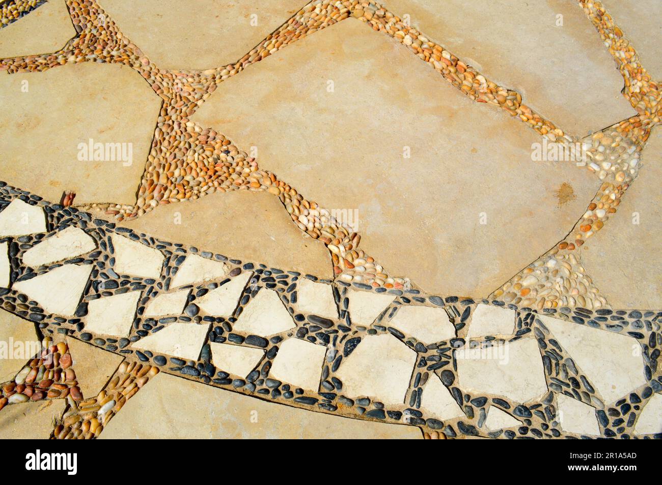 Texture of a stone wall, roads from stones, bricks, cobblestones, tiles ...