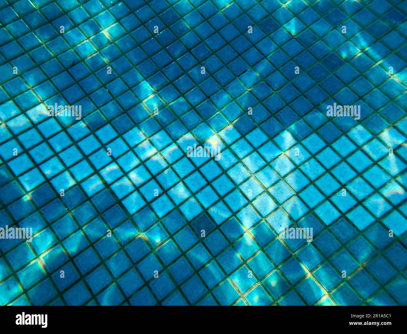 Ocean Texture Tile Water Wave In Swimming Pool With Light Reflecting.