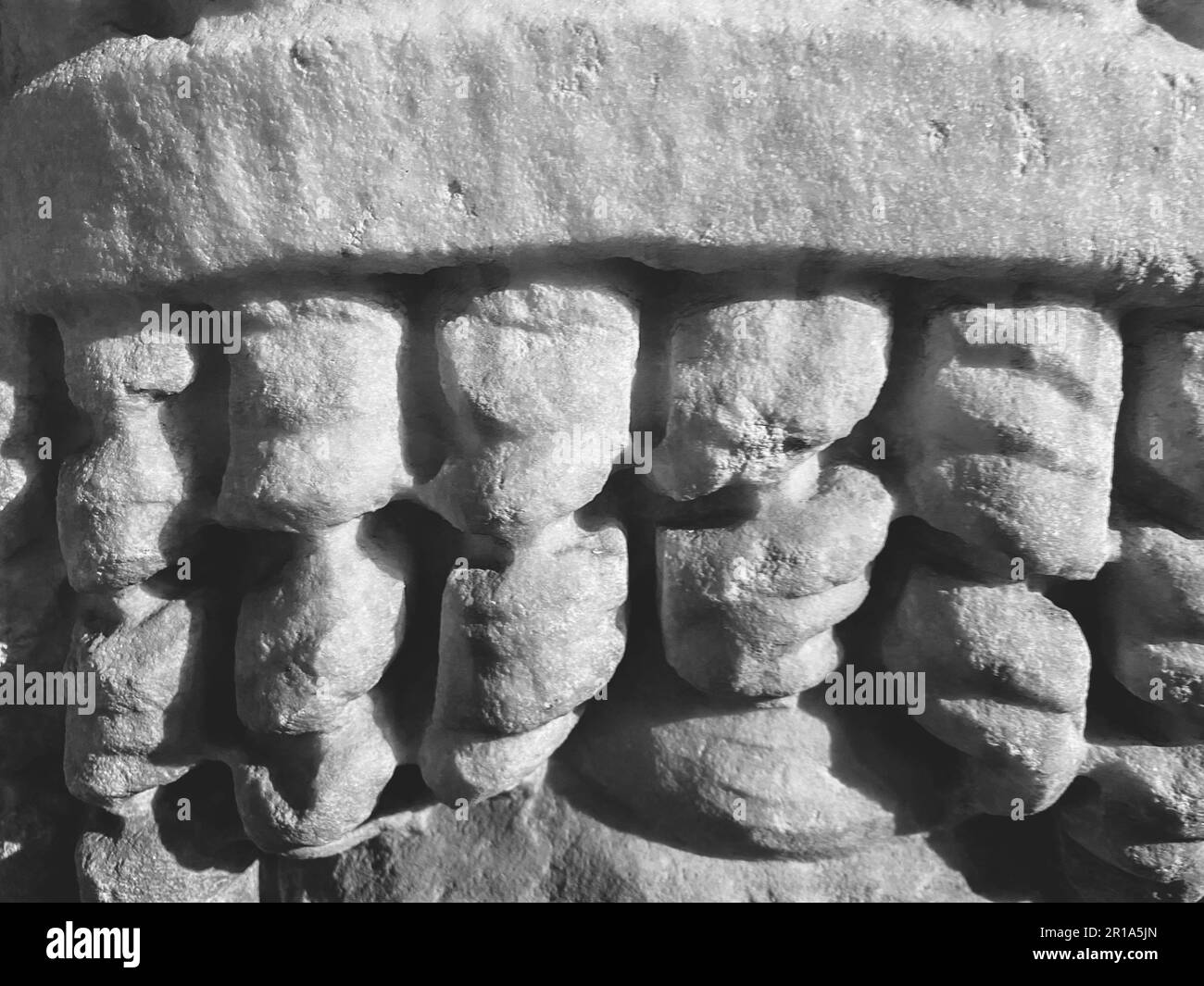 ancient texture. a gray stone, a piece of a statue. volumetric texture ...