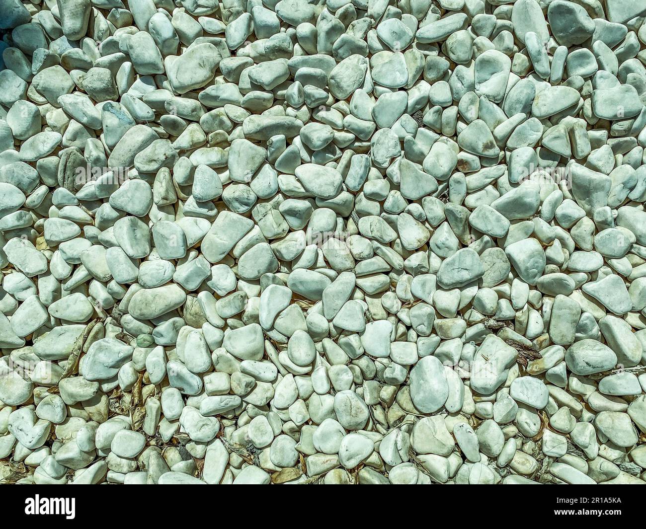 texture, small, gray stones lie on the road. material for the ...