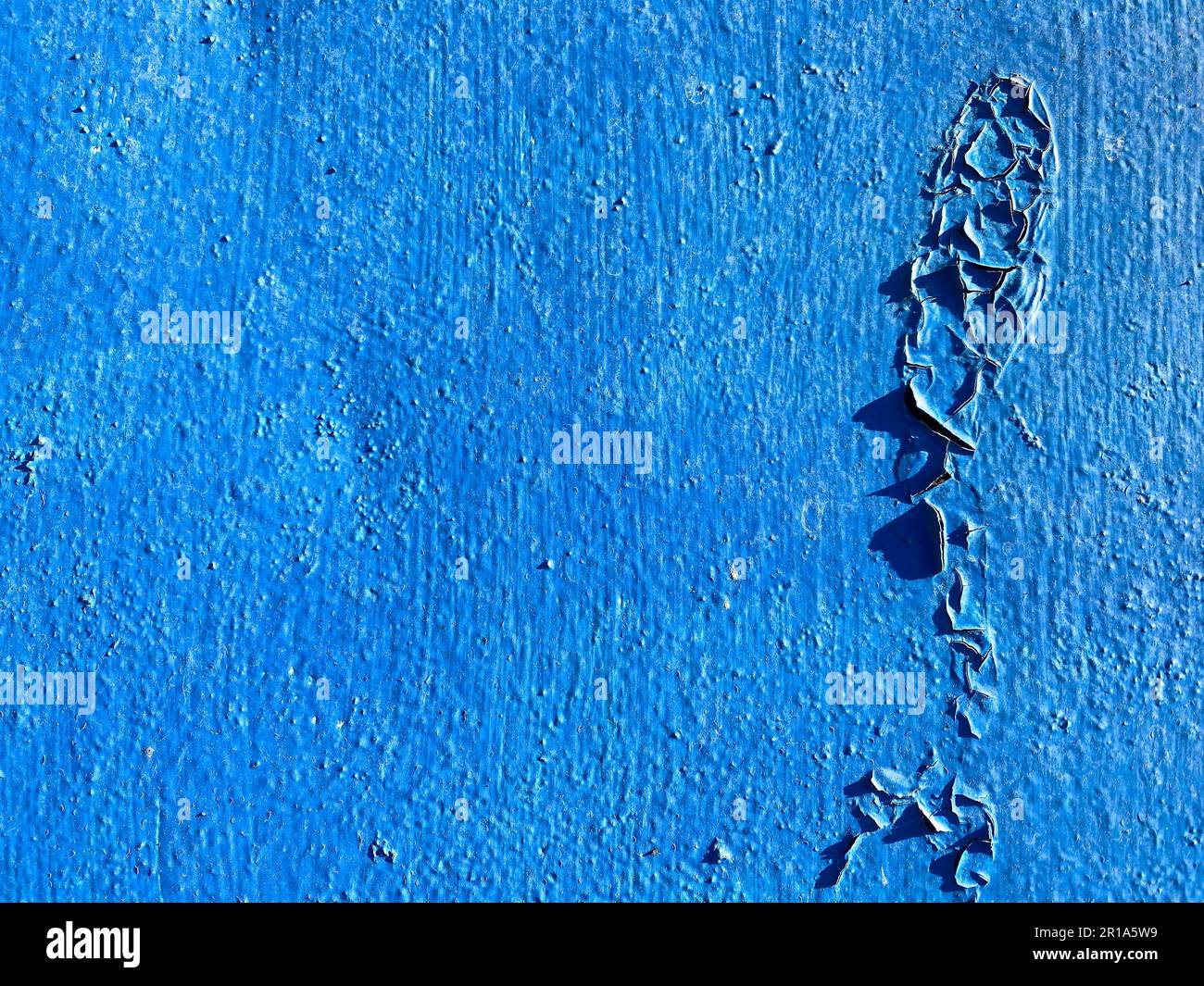 Texture of an old metal iron scratched surface with swollen flaking paint. The background Stock ...