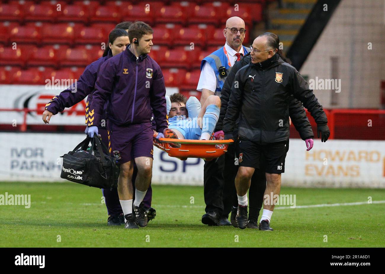 Coventry City’s Callum Perry is stretchered off the pitch during the ...
