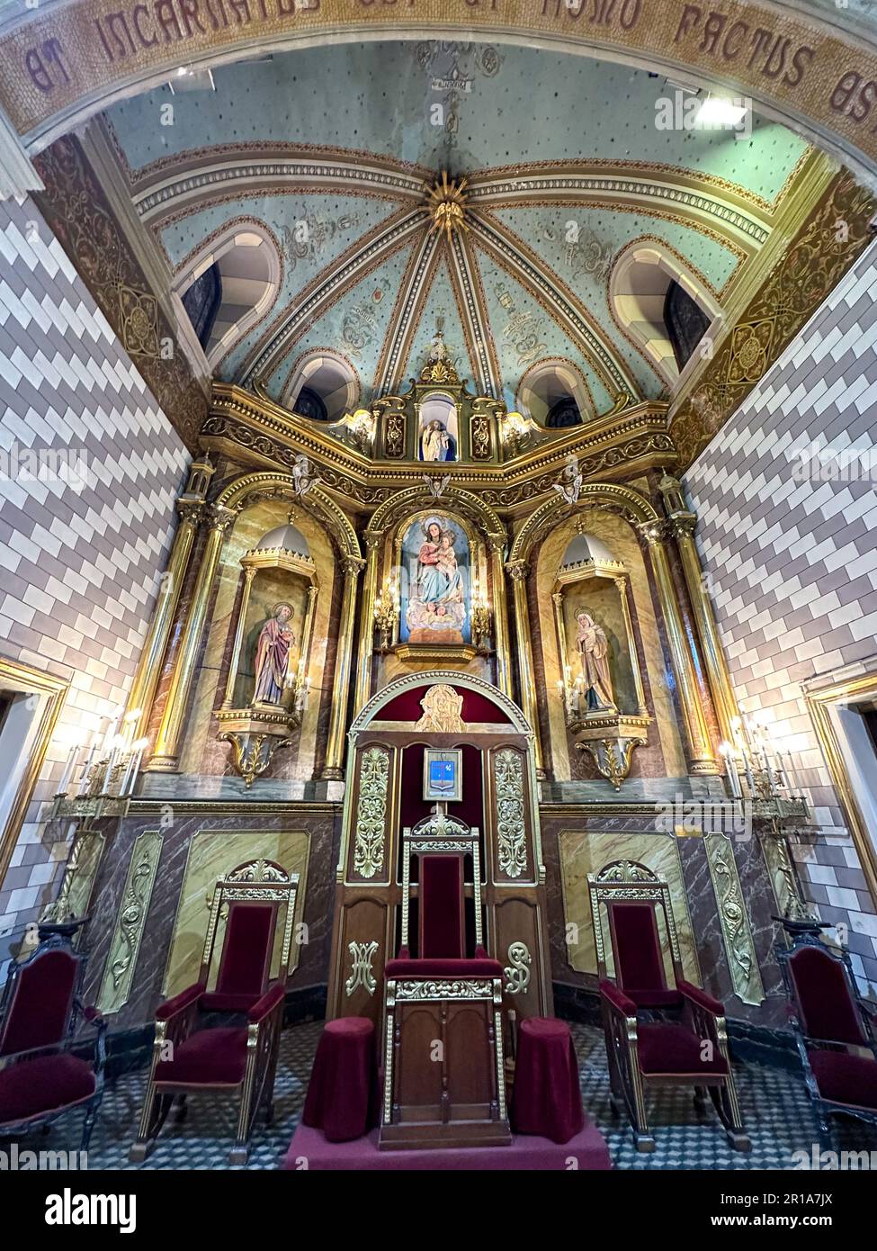 The cathedra or bishop's chair & main altarpiece in the apse of Our ...