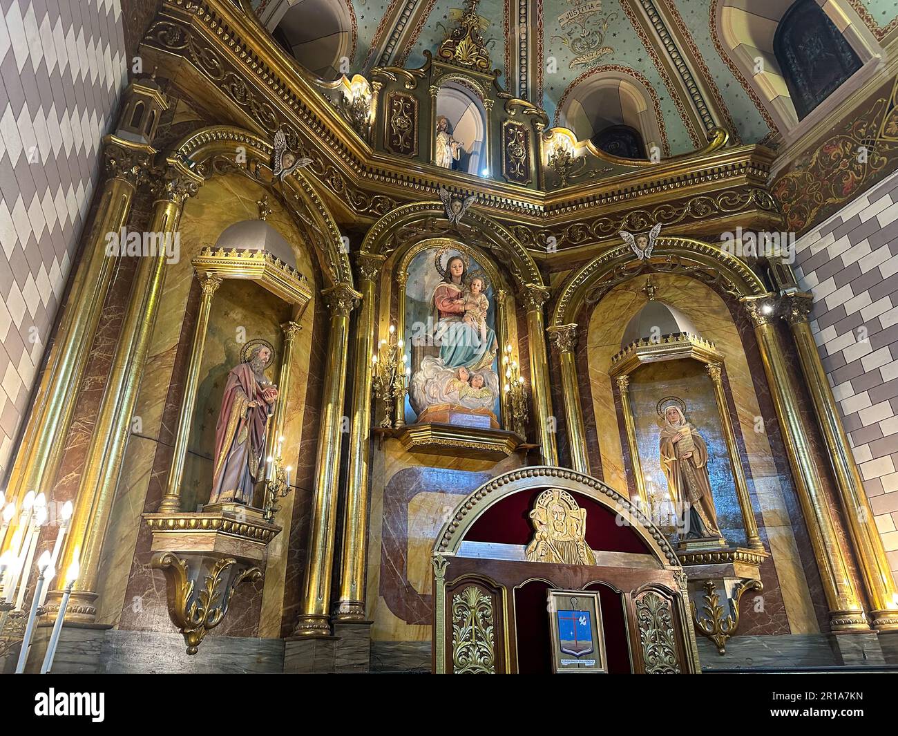 The back of the cathedra or bishop's chair & main altarpiece in the ...
