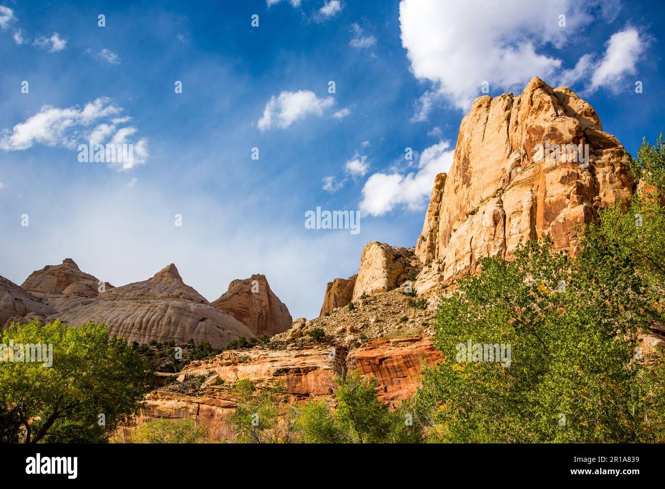 The pointed Navajo sandstone pyramid known as the Navajo Dome, at left ...