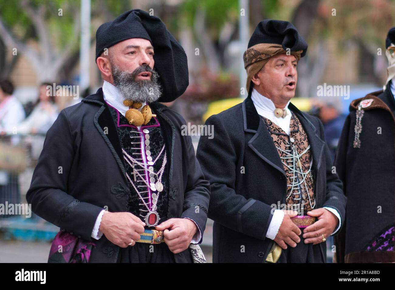 Sardinian men dressed in folk traditional costumes, with unique ...