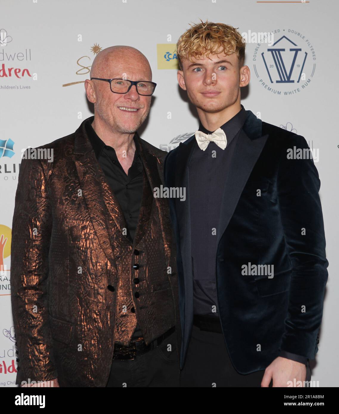 London, UK. John Caudwell and Casey Barker at The Caudwell Children ...