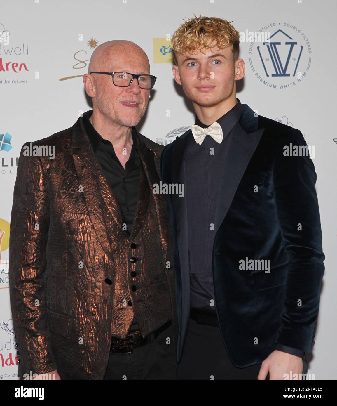 London, UK. John Caudwell and Casey Barker at The Caudwell Children ...