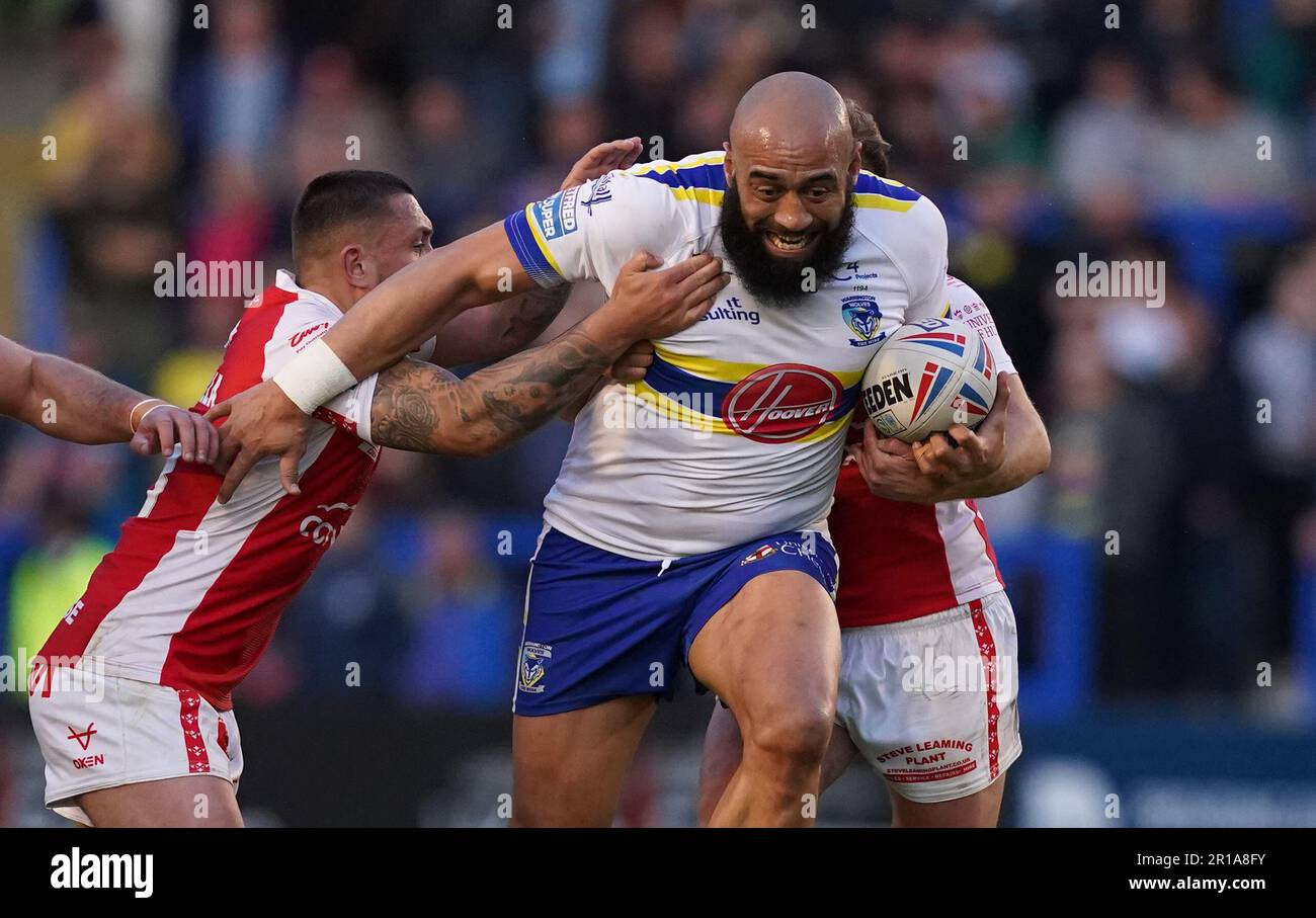 Warrington Wolves' Sam Kasiano gets away from Hull KR's Elliot ...