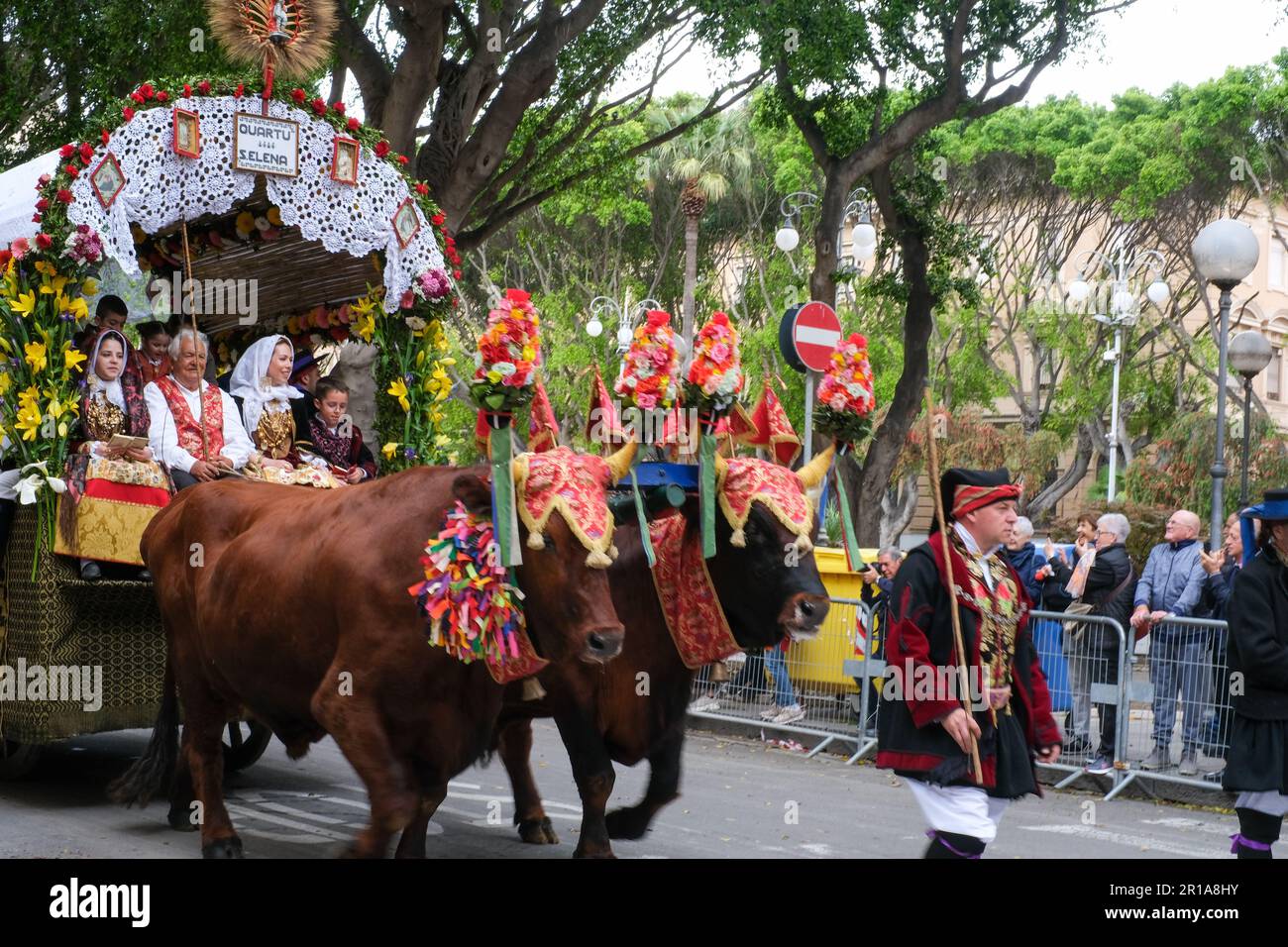 A traditional flower-covered, oxen-pulled chariot chart known as a ...