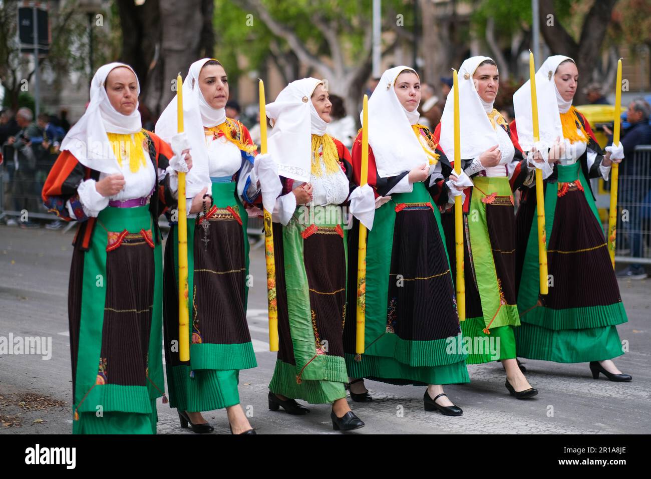 Sardinian women dressed in folk traditional costumes, with unique ...