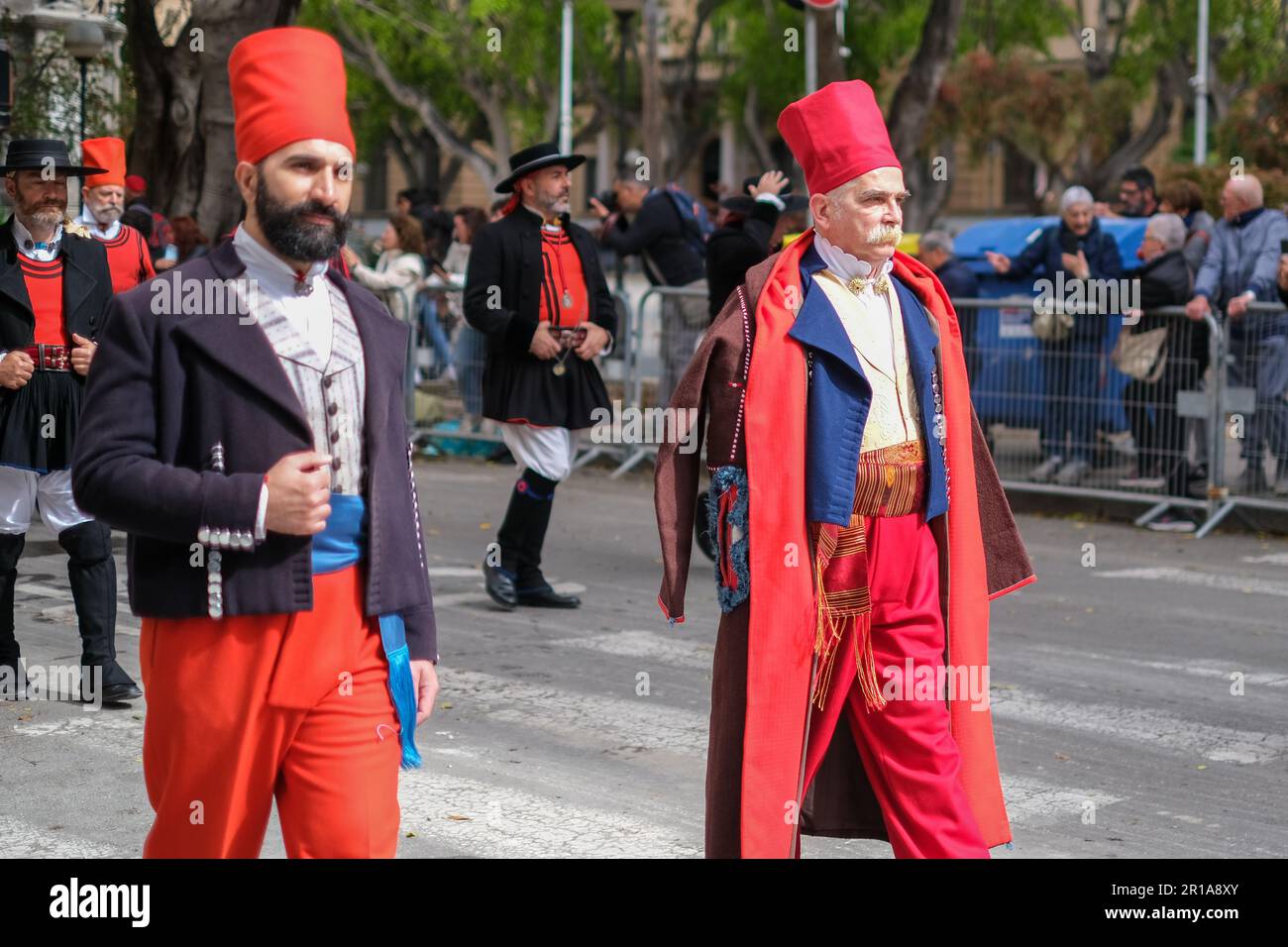 Sardinian men dressed in folk traditional costumes, with unique ...