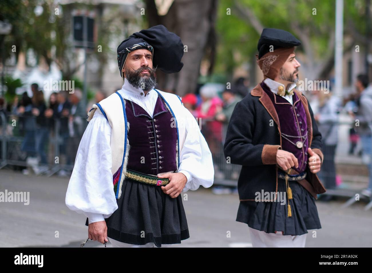 Sardinian men dressed in folk traditional costumes, with unique ...