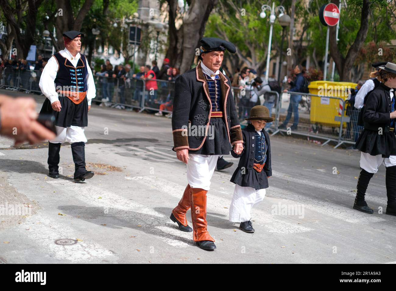 Sardinian men dressed in folk traditional costumes, with unique ...