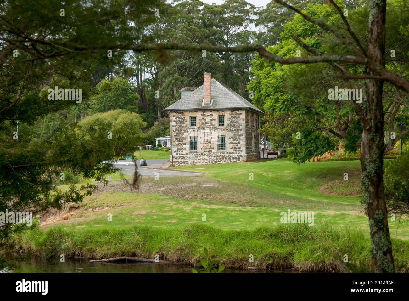 Old stone store framed by trees at Kerikeri Stock Photo - Alamy