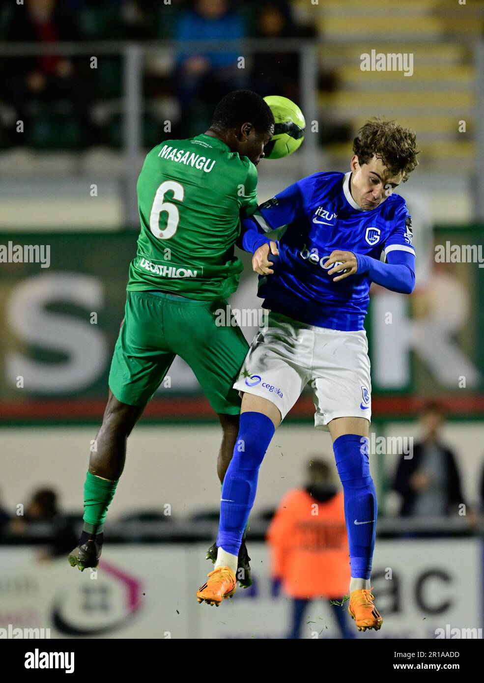 Virton, Belgium. 12th May, 2023. Virton's Keres Masangu and Jong Genk's Kamiel Van de Perre ...