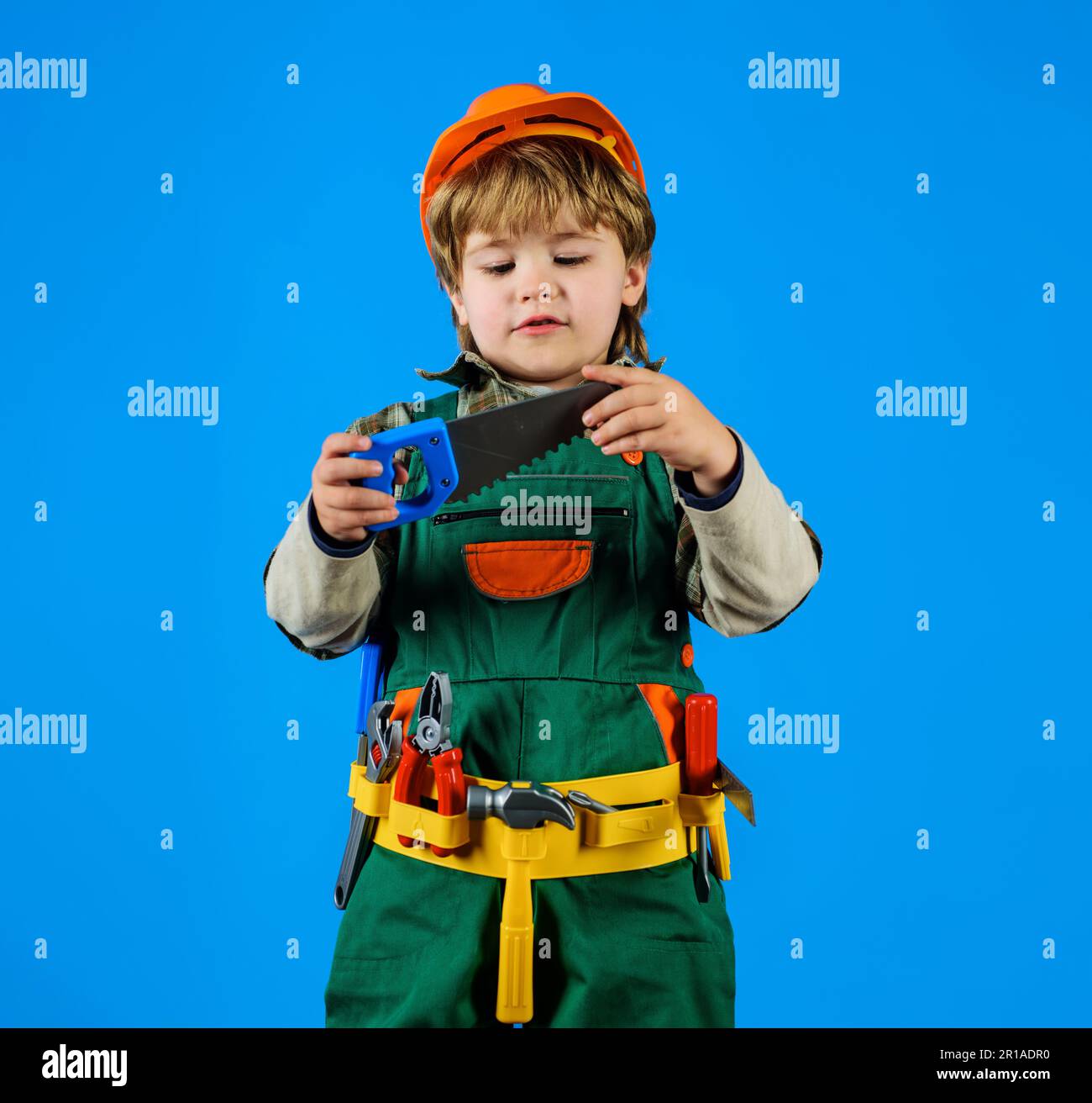 Tools work boy child construction hi-res stock photography and images ...