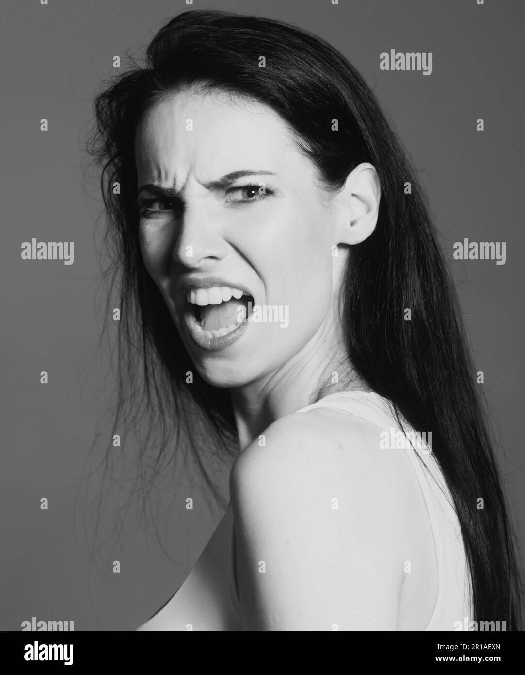 Angry woman face, upset girl. Screaming, hate, rage. Pensive woman feeling furious mad and crazy ...