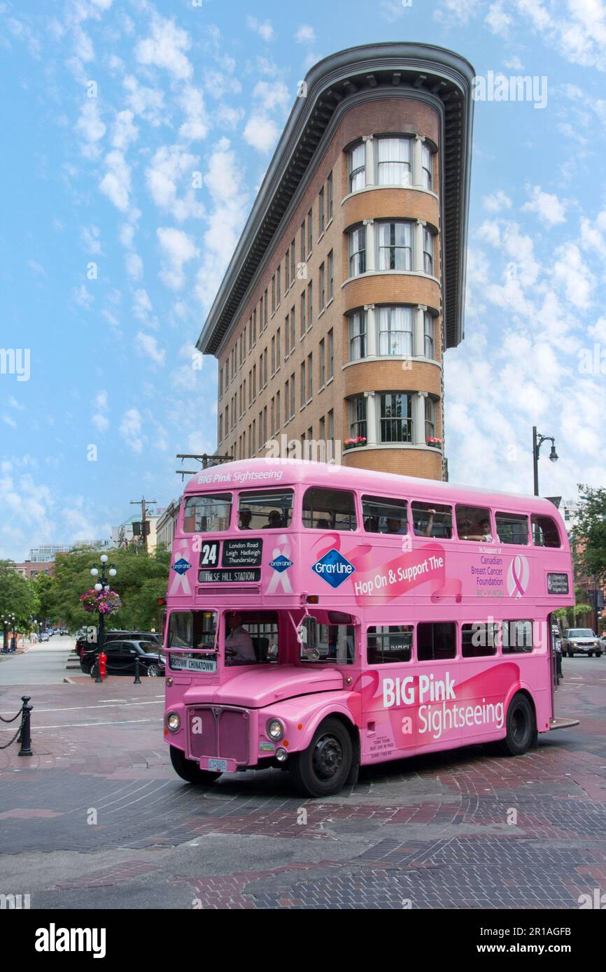 Pink double-decker bus in Vancouver, Canada Stock Photo - Alamy