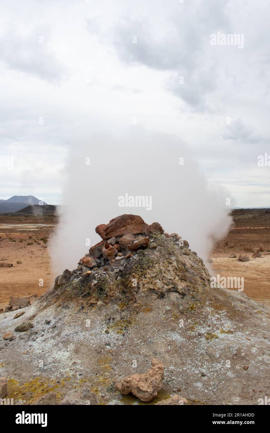 Fumarole evacuating pressurized hot gases from volcanic activity in a ...