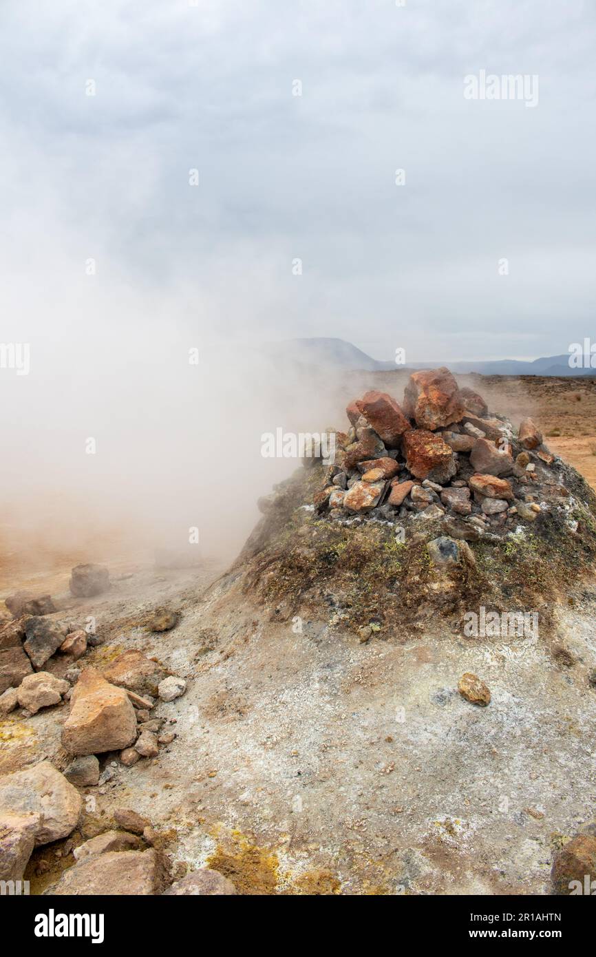 Fumarole evacuating pressurized hot sulfurous gases from volcanic ...