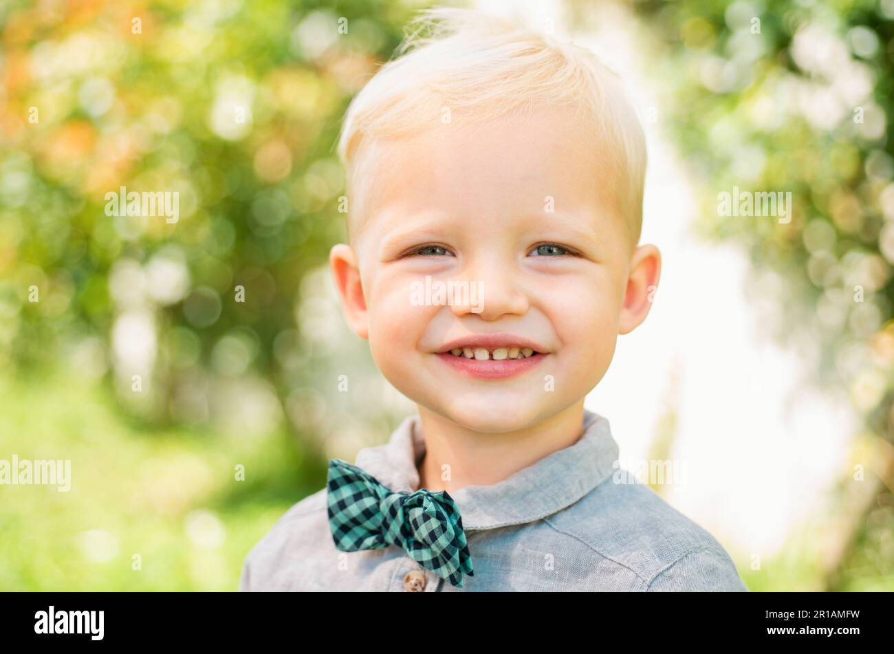 Spring kids smiling portrait. Closeup face of cute smiling spring child ...
