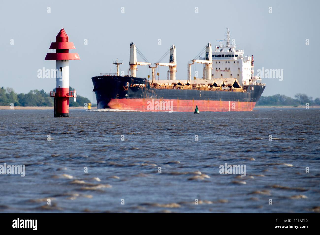 Nordenham, Germany. 12th May, 2023. The cargo ship "Lady Doris" passes ...