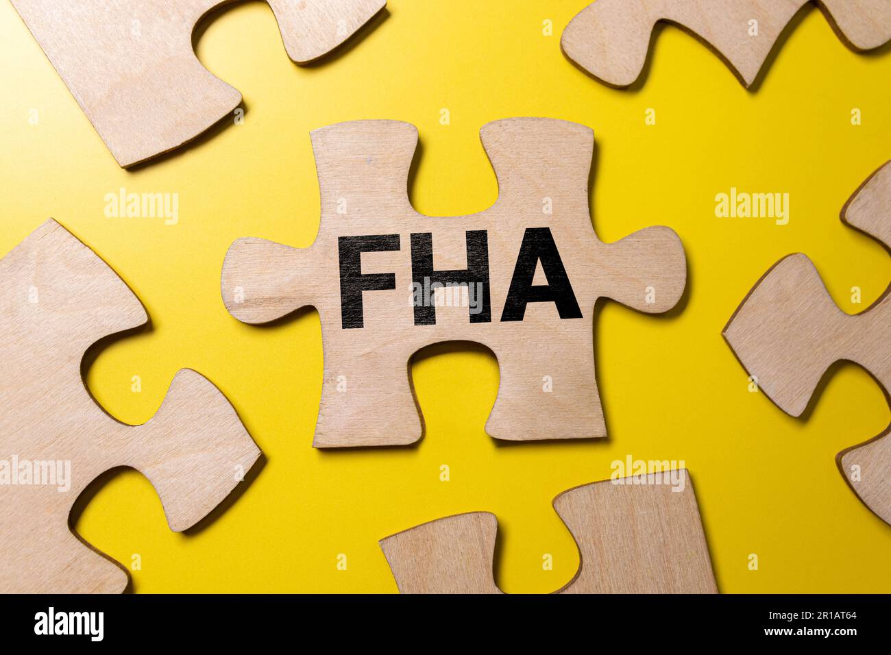 FHA, federal housing administration symbol. Wooden block with word 'FHA ...