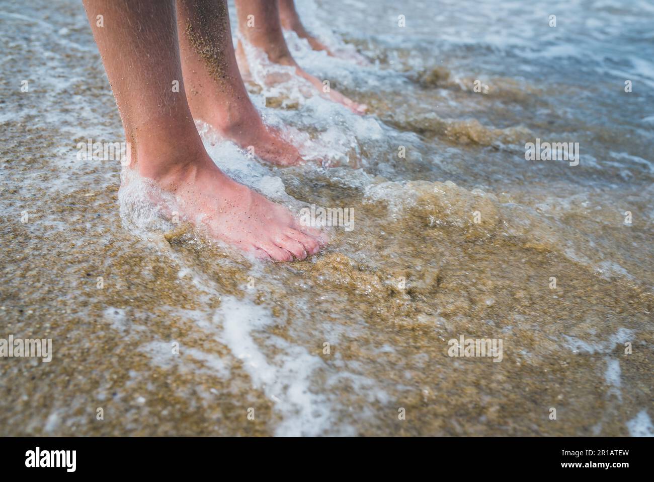 Kids feet beach hi-res stock photography and images - Alamy