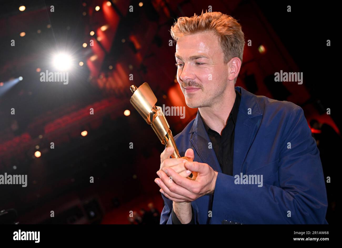 Berlin, Germany. 12th May, 2023. Albrecht Schuch, actor, holds the ...