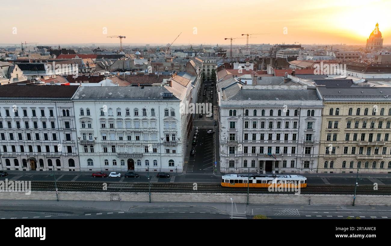 Typical Budapest Tram passing through city neighbourhood in beautiful ...
