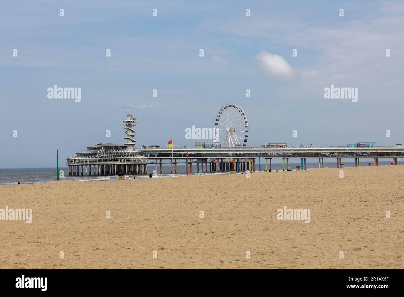 Dutch beach at popular Dutch tourist destination with famous pier and ...