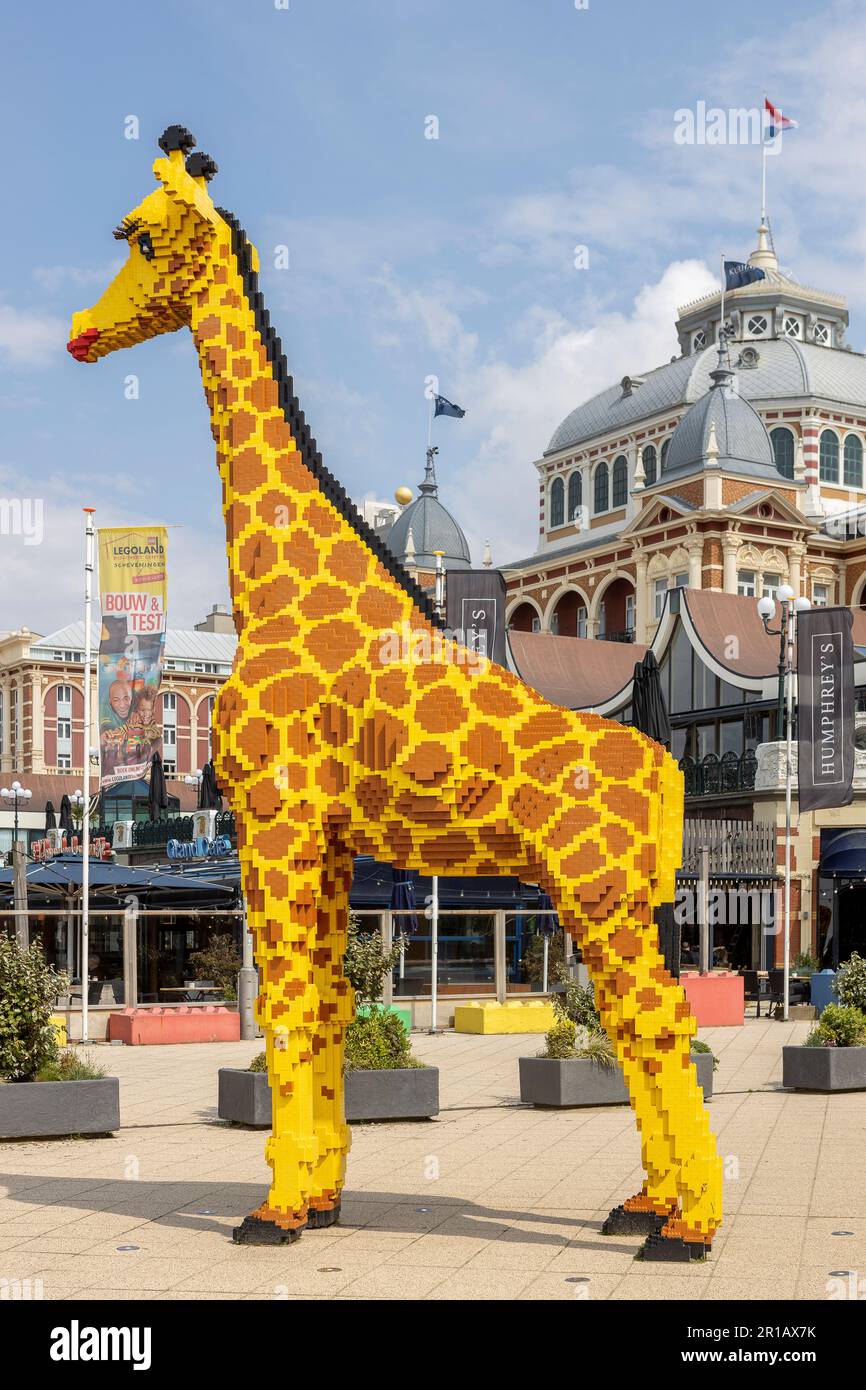 Large lego giraffe on boulevard in front of famous Kurhaus beach hotel ...