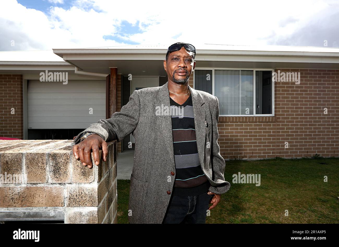 Sierra Leonean refugee Adeyemi Johnson poses for a photograph in ...