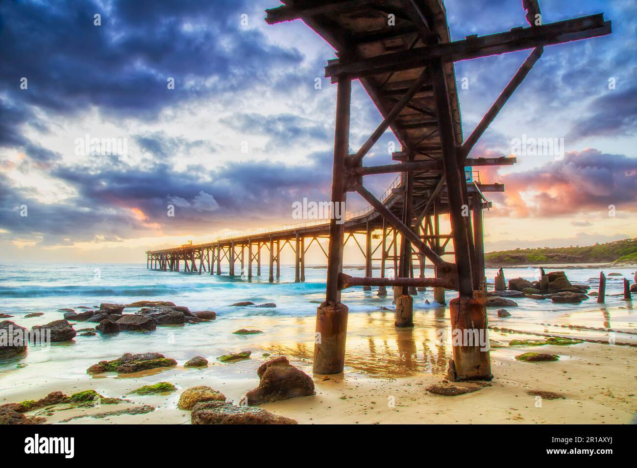 Historic timber coal loader jetty at Catherine Hill bay coastal town of ...