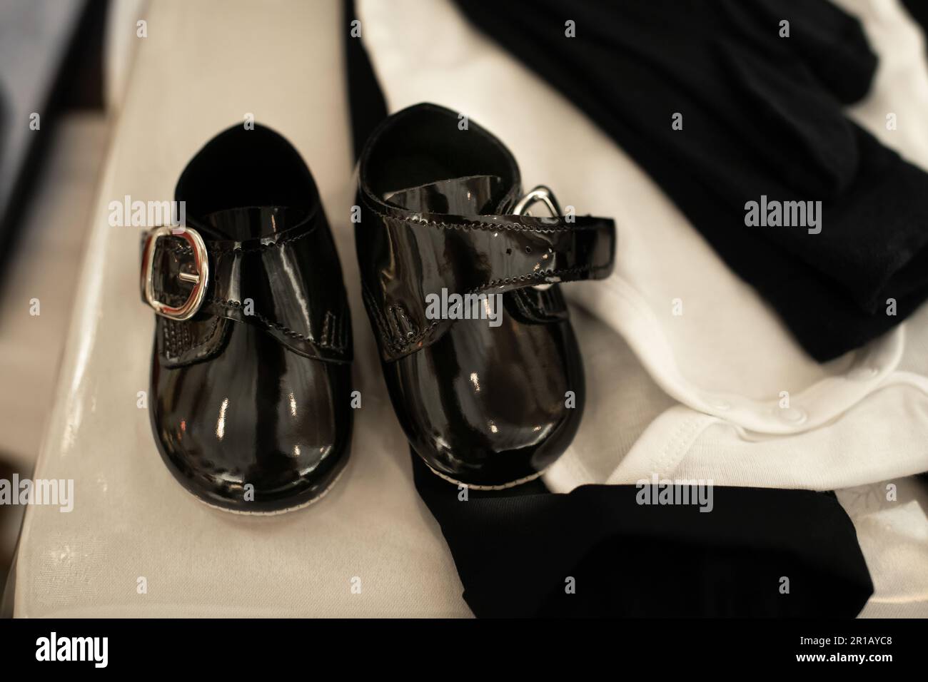 Patent leather shoes for a child in a church for christening Stock ...