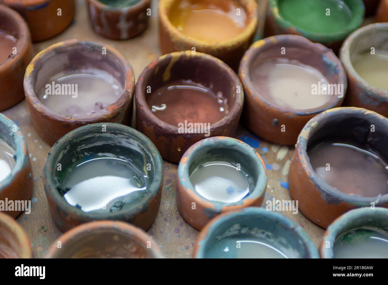 Peruvian paint cups ready to be filled with paint Stock Photo - Alamy
